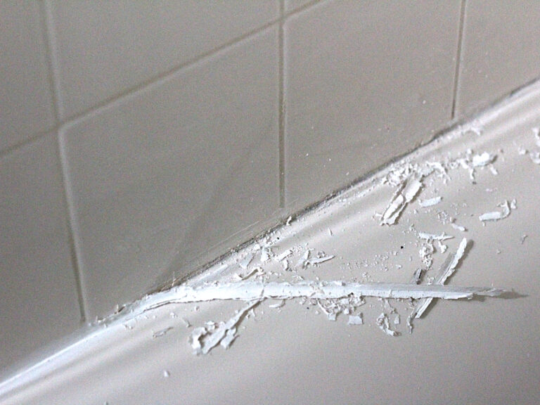 How to Re-caulk a Bathtub: A Step-by-Step Guide - Dani's Midlife Homestead