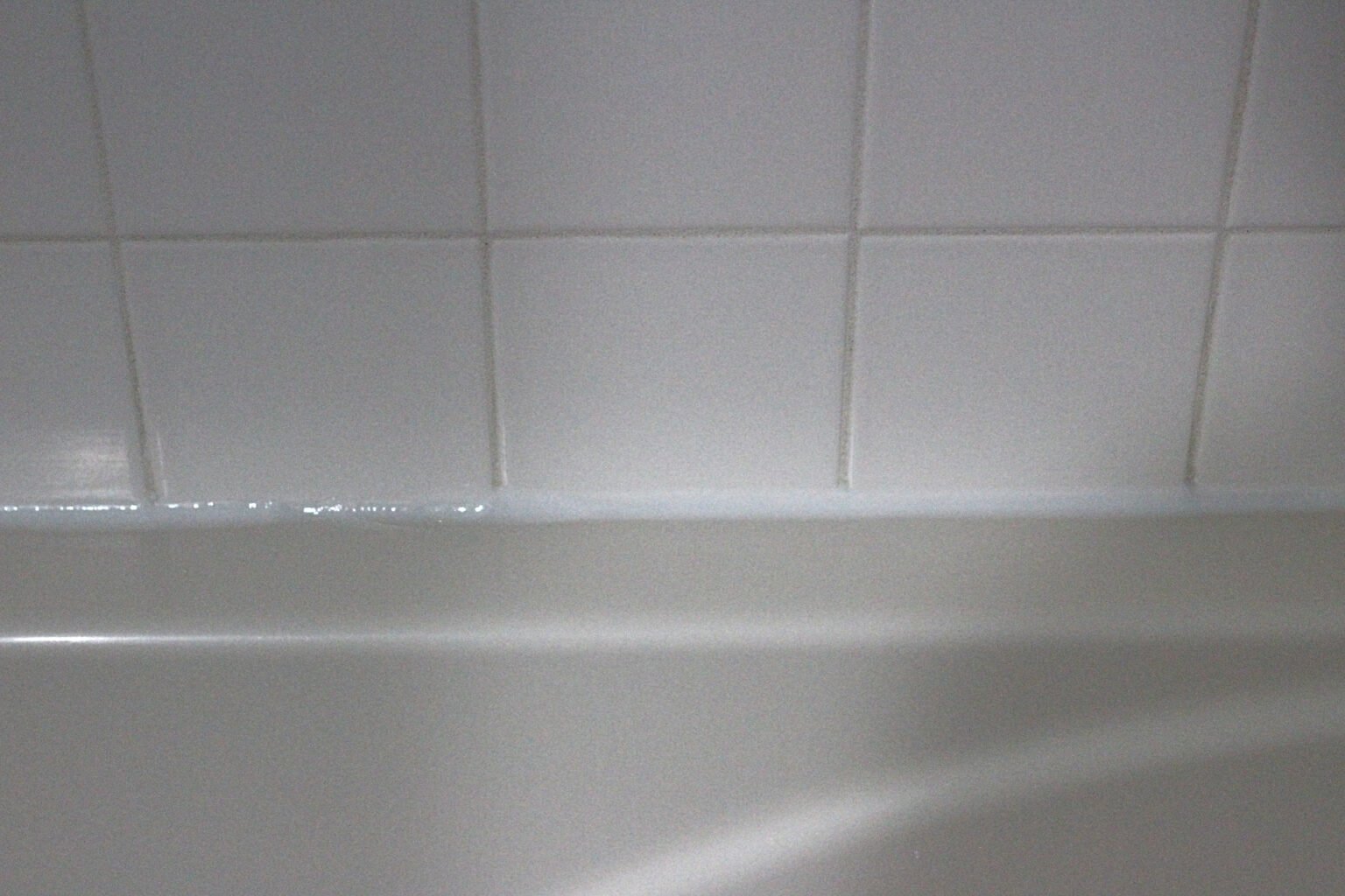 How to Re-caulk a Bathtub: A Step-by-Step Guide - Dani's Midlife Homestead