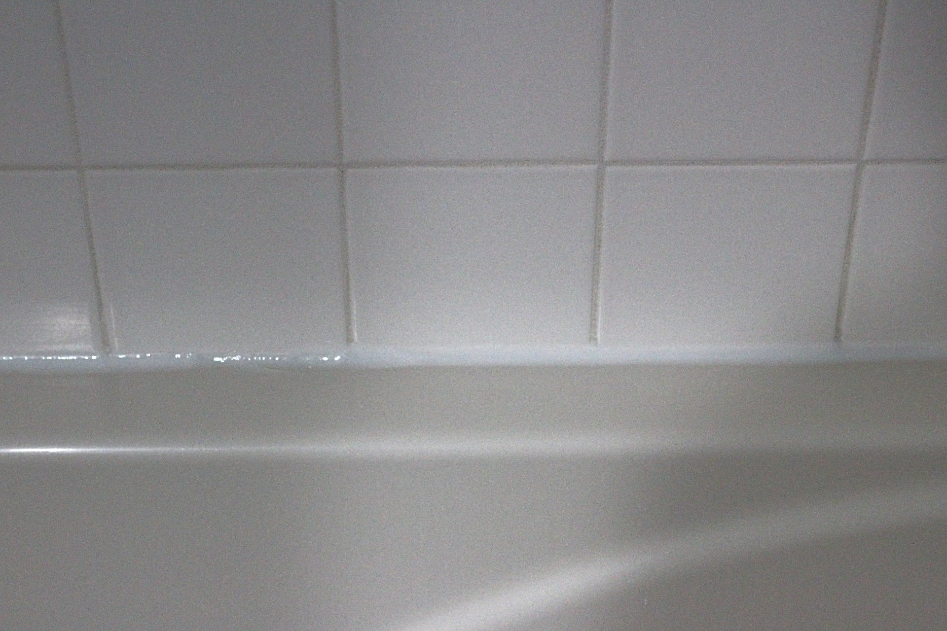 How to Re-caulk a Bathtub: A Step-by-Step Guide - Dani's Midlife Homestead